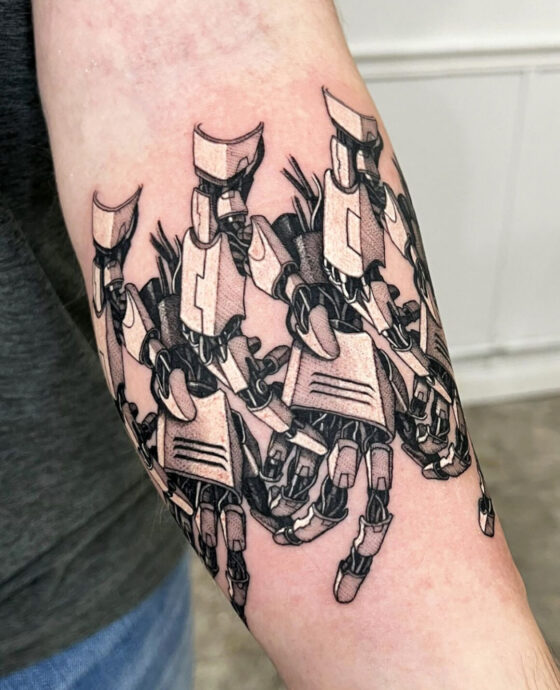 Robots of the future in biomechanical tattoos by Pisatche - Tattoo Life