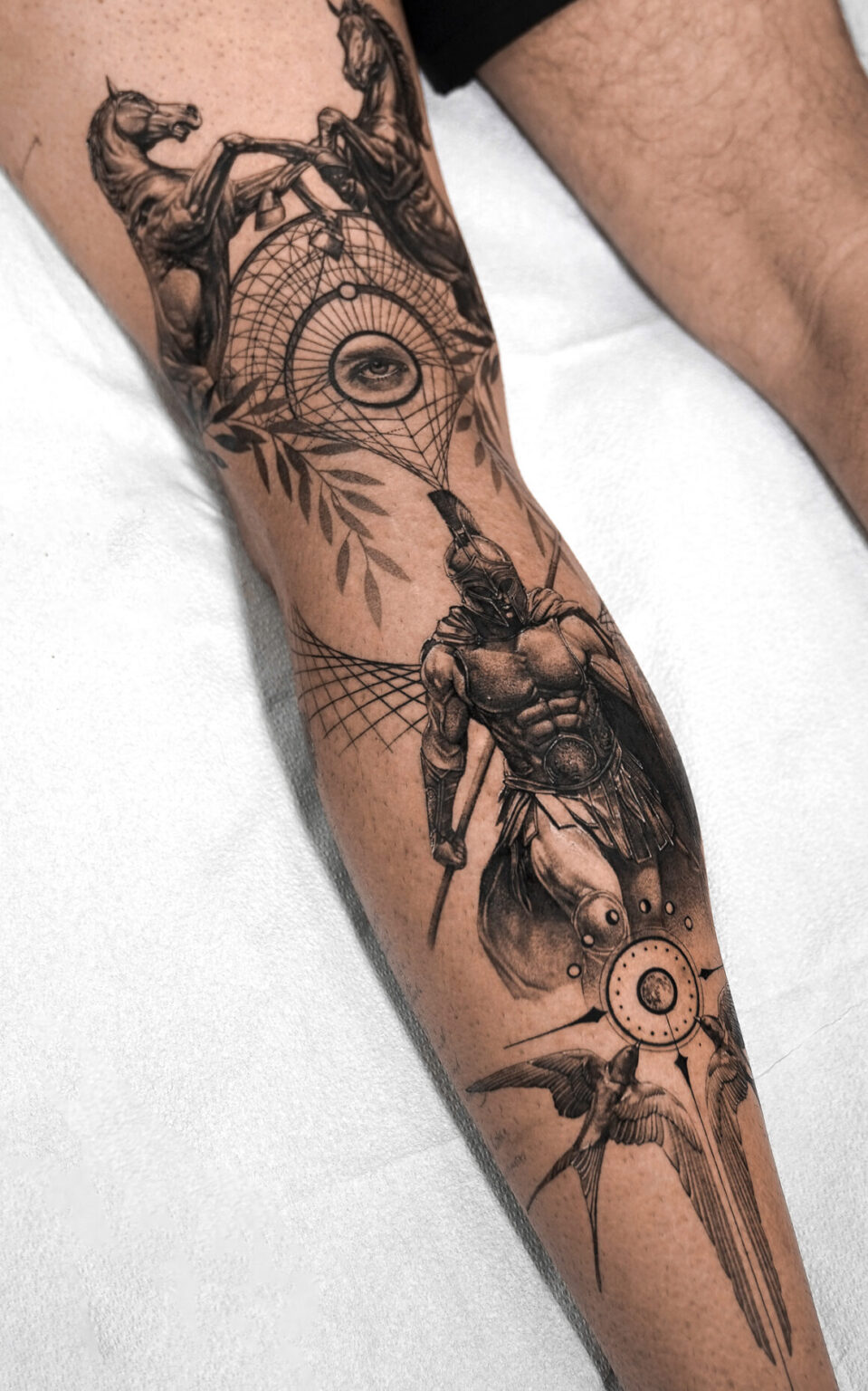 Ogi: Black & Grey Fine Line with Geometric Flow - Tattoo Life