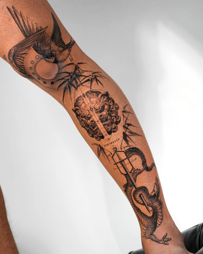 Ogi: Black & Grey Fine Line with Geometric Flow - Tattoo Life